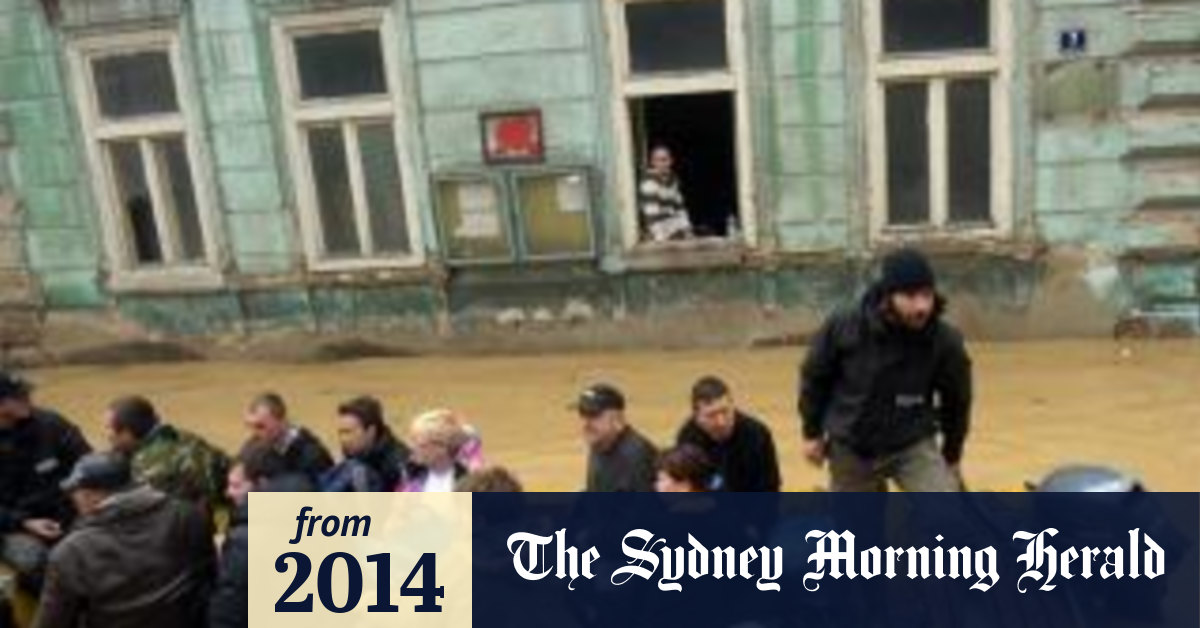 Thousands flee deadly floods in Serbia, Bosnia